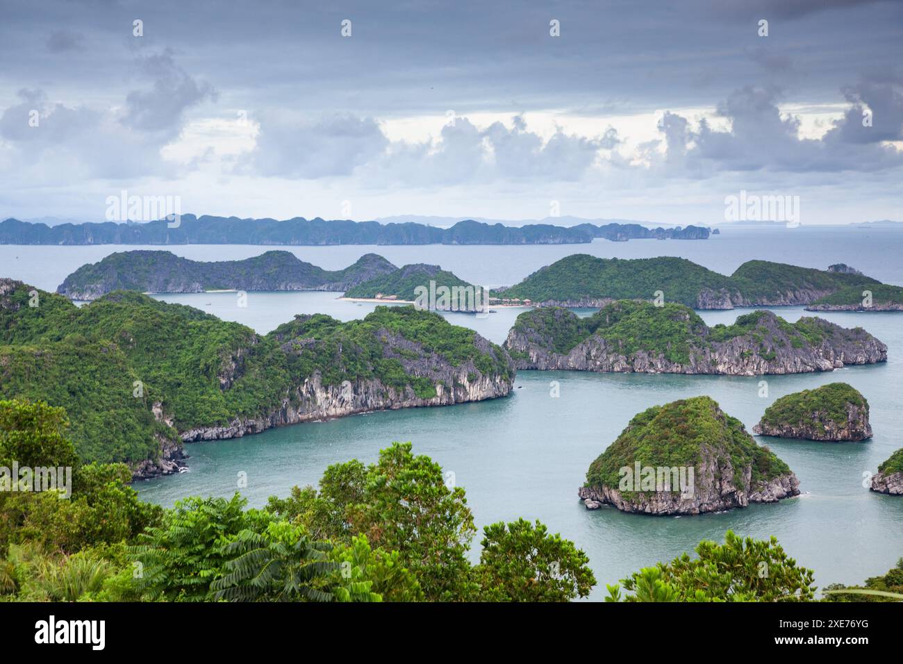 Ha Long Bay from Cat Ba island, Ha Long city in the background, UNESCO ...