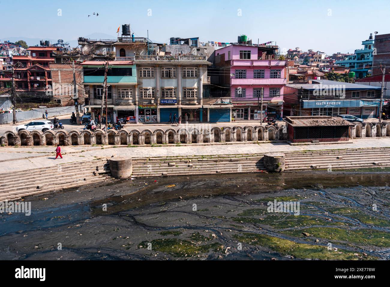 View over the polluted waters of the holy Bagmati River in front of ...
