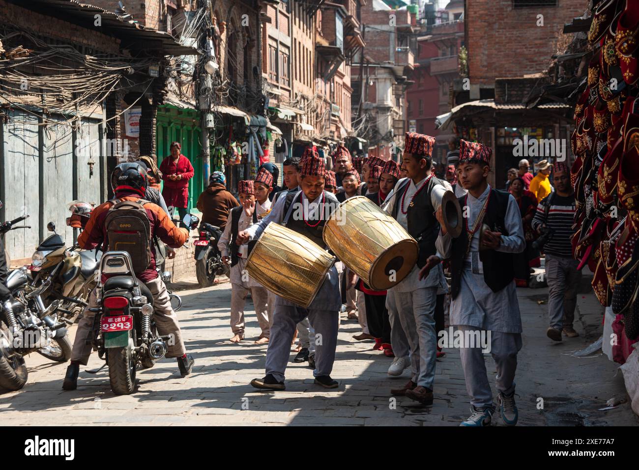 Traditional drum band with bronze drums celebrating in the streets of ...