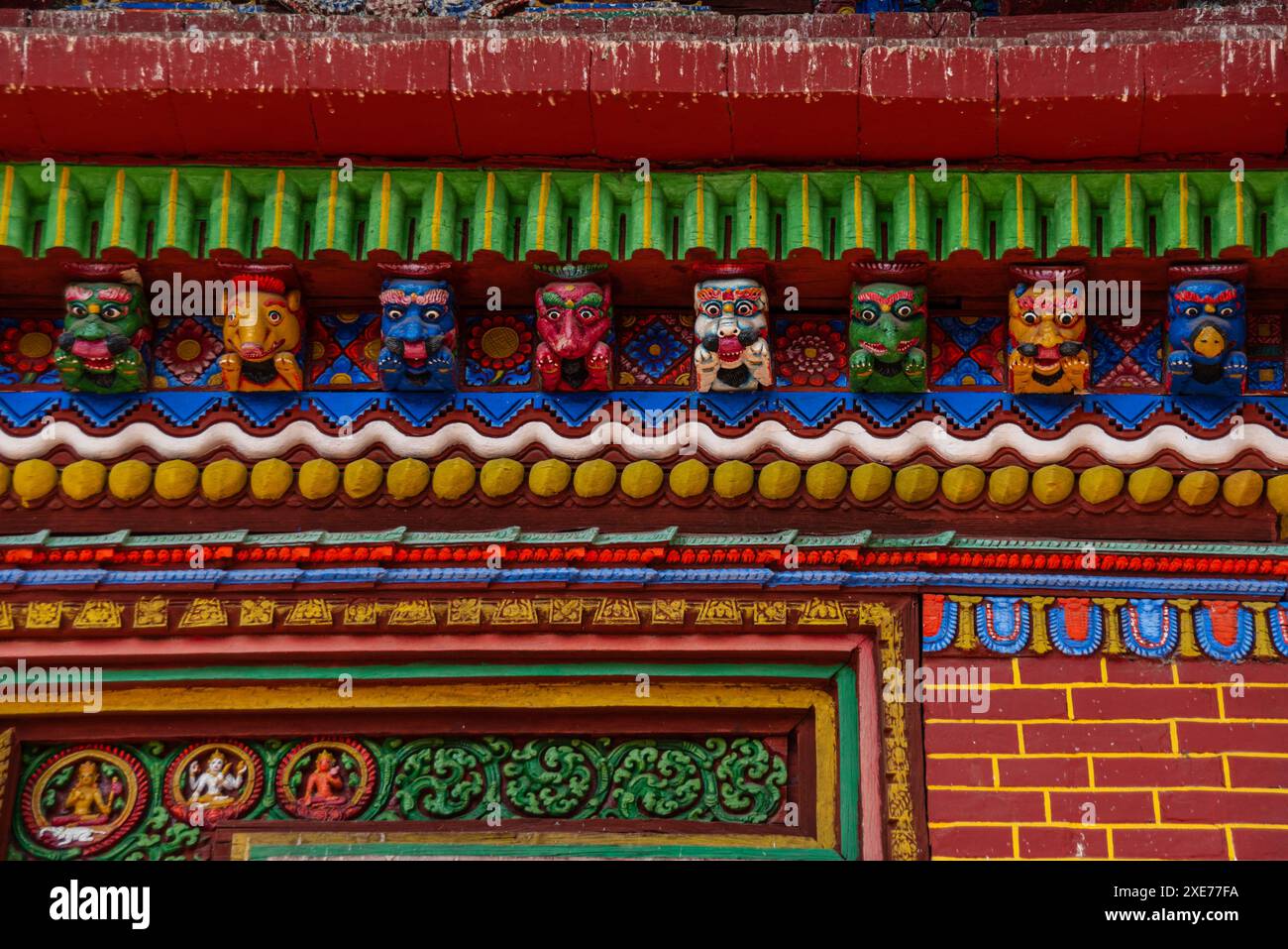 Detail of colorful wood carved faces of Changu Narayan Temple, Nepal ...