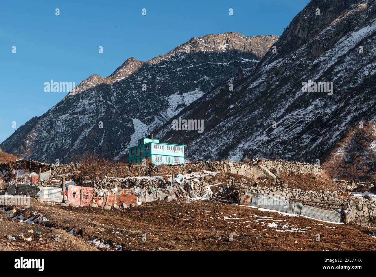 Turquoise Lodge in front of Mountain ranges, Lang Tang Village, a high ...