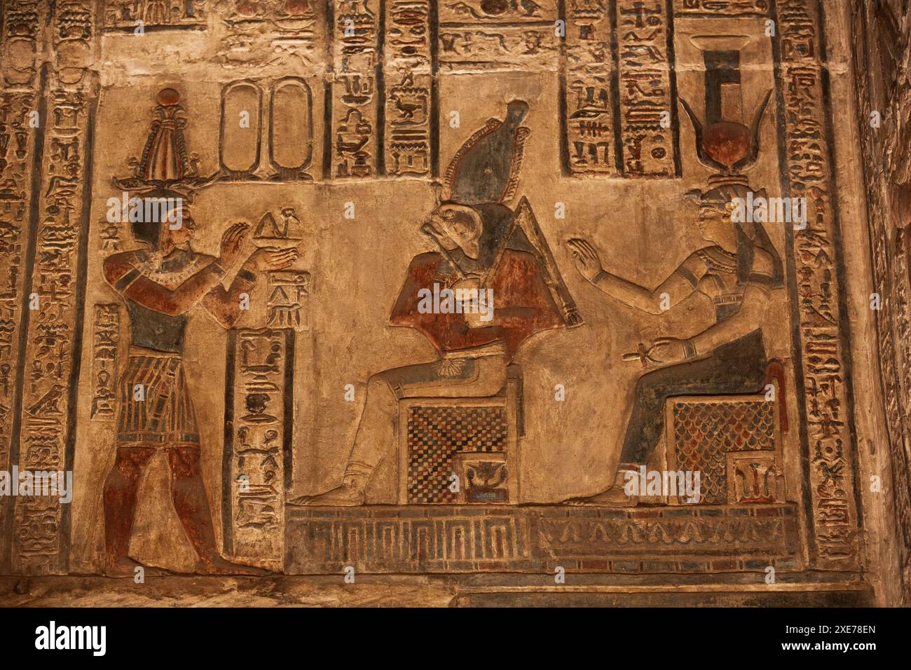 Reliefs of Pharaoh on left, God Horus in center, and Goddess Hathor on ...