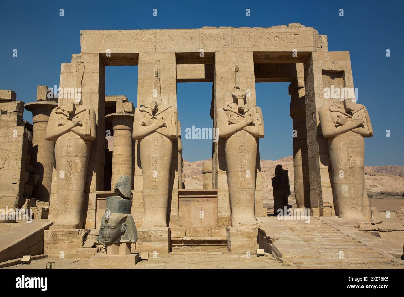 Granite Head of Ramesses II in front of Osiris Statues, Ramesseum ...