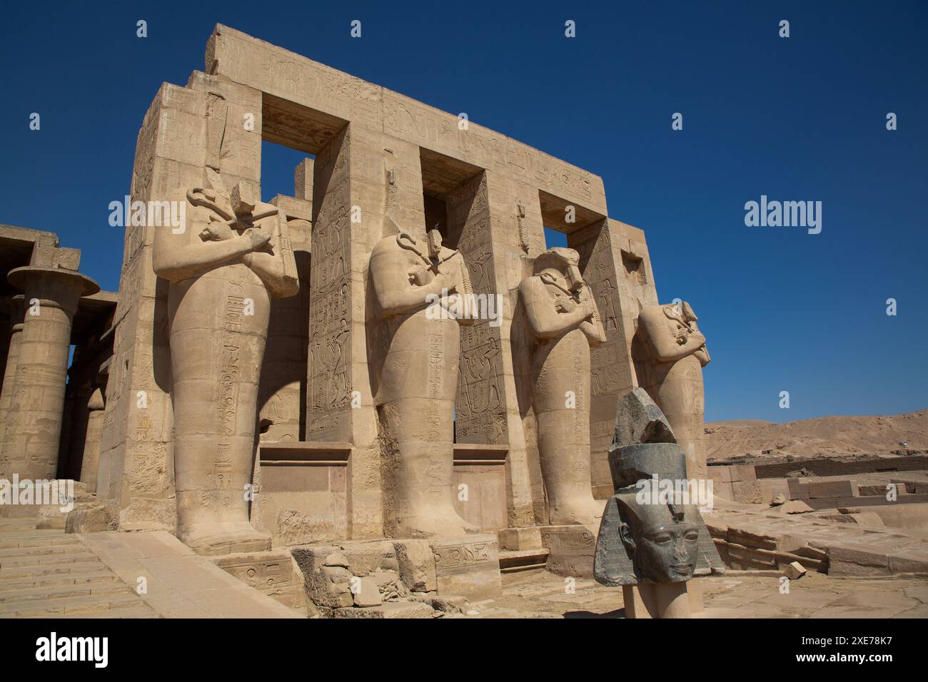 Granite Head of Ramesses II in front of Osiris Statues, Ramesseum ...