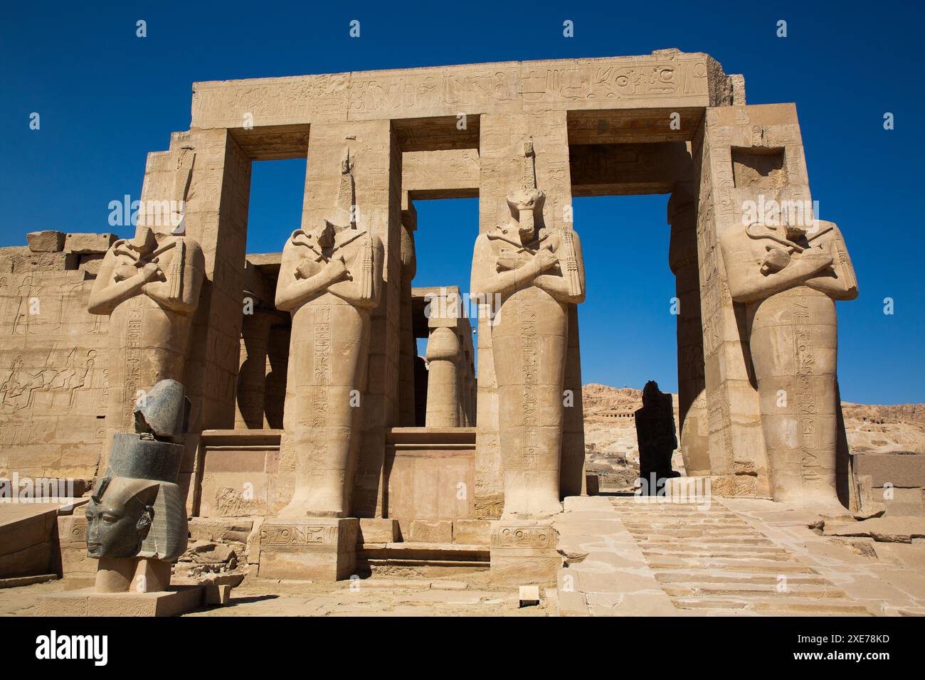 Granite Head of Ramesses II in front of Osiris Statues, Ramesseum ...