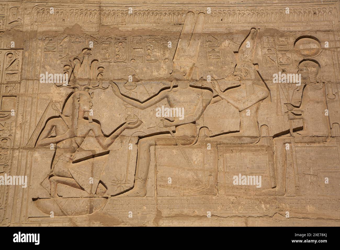 Pharaoh on left, God Atum in center, Reliefs, Ramesseum, Memorial ...
