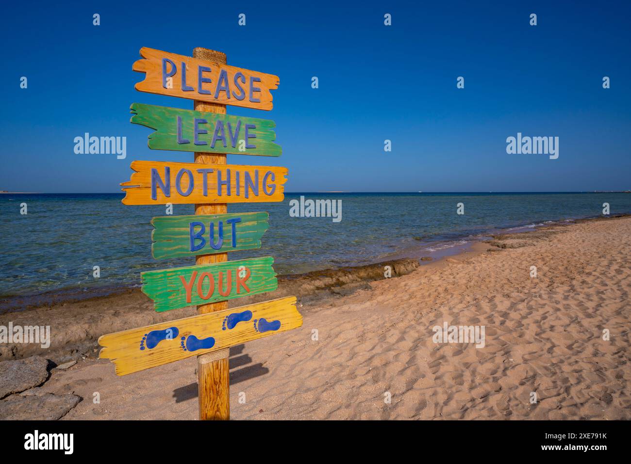 View of sign reading Please Leave Nothing But Your Footprints on the ...