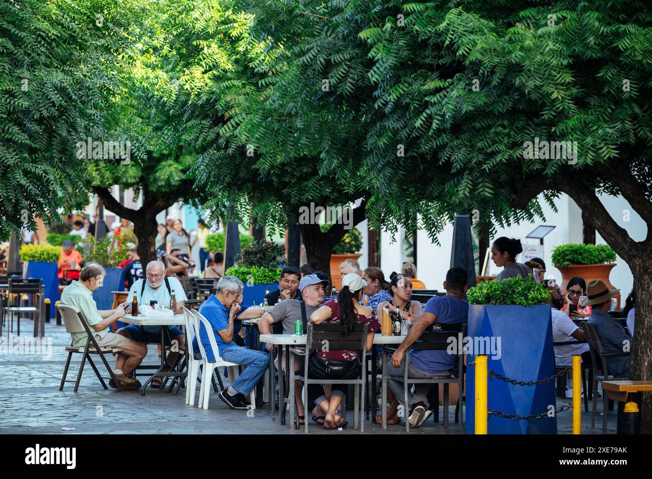 People eating outside restaurant, Granada, Nicaragua, Central America ...
