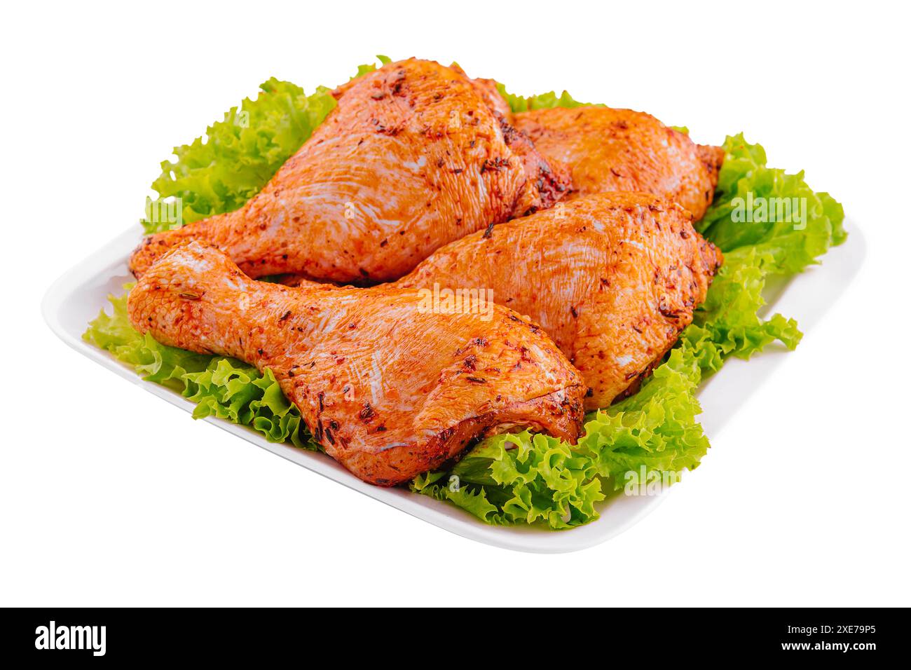 Raw uncooked marinated chicken legs on plate Stock Photo - Alamy