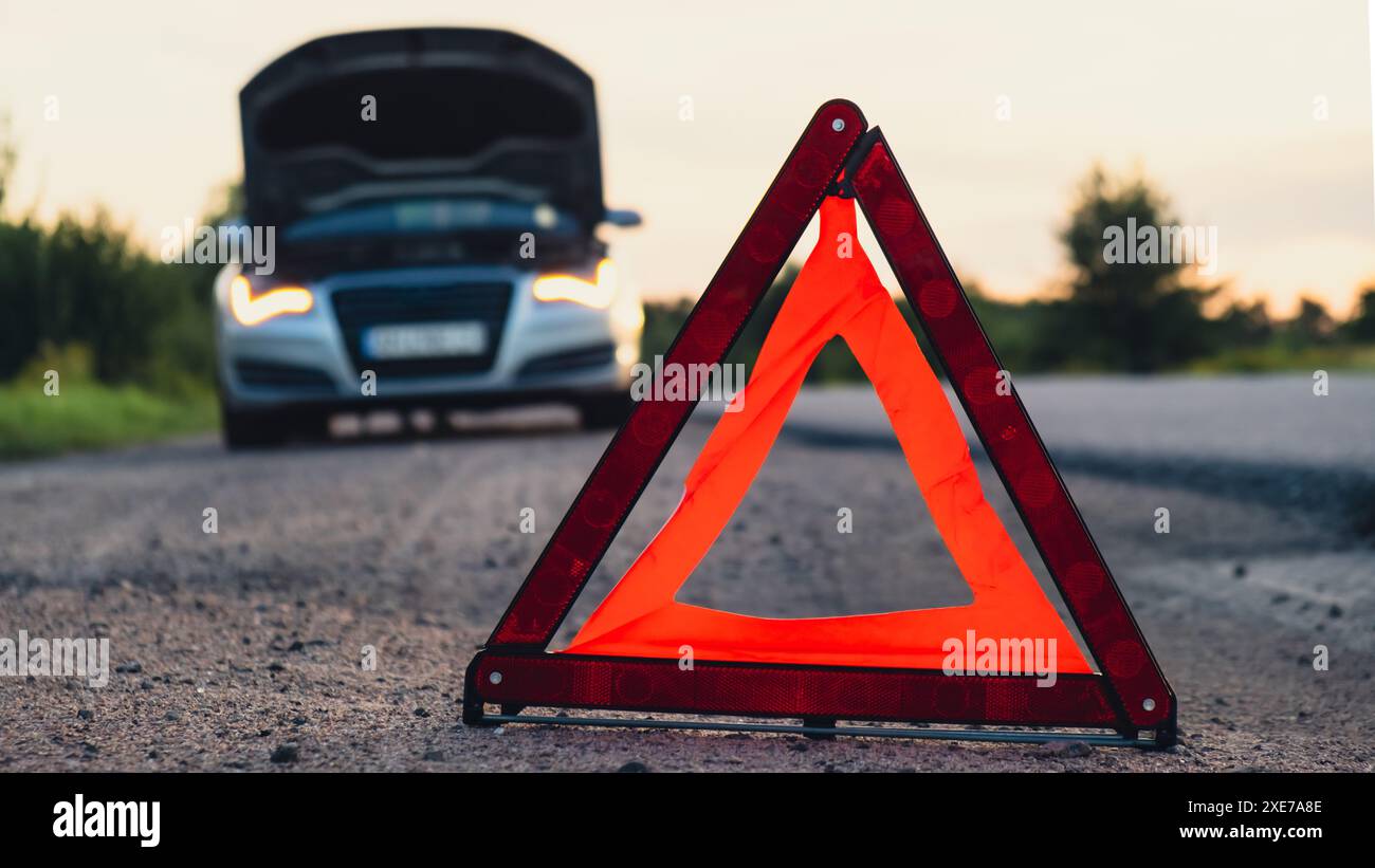 Car standing near stop sign hi-res stock photography and images - Alamy