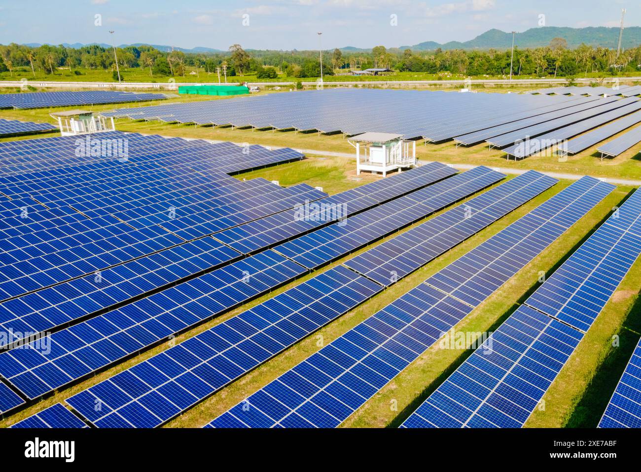 Solar panels sun power on the field in summer aerial view in Thailand ...