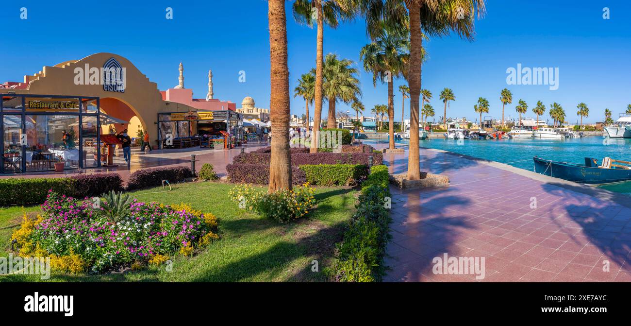 View of cafe and waterfront in Hurghada Marina and Al Mina Mosque in ...