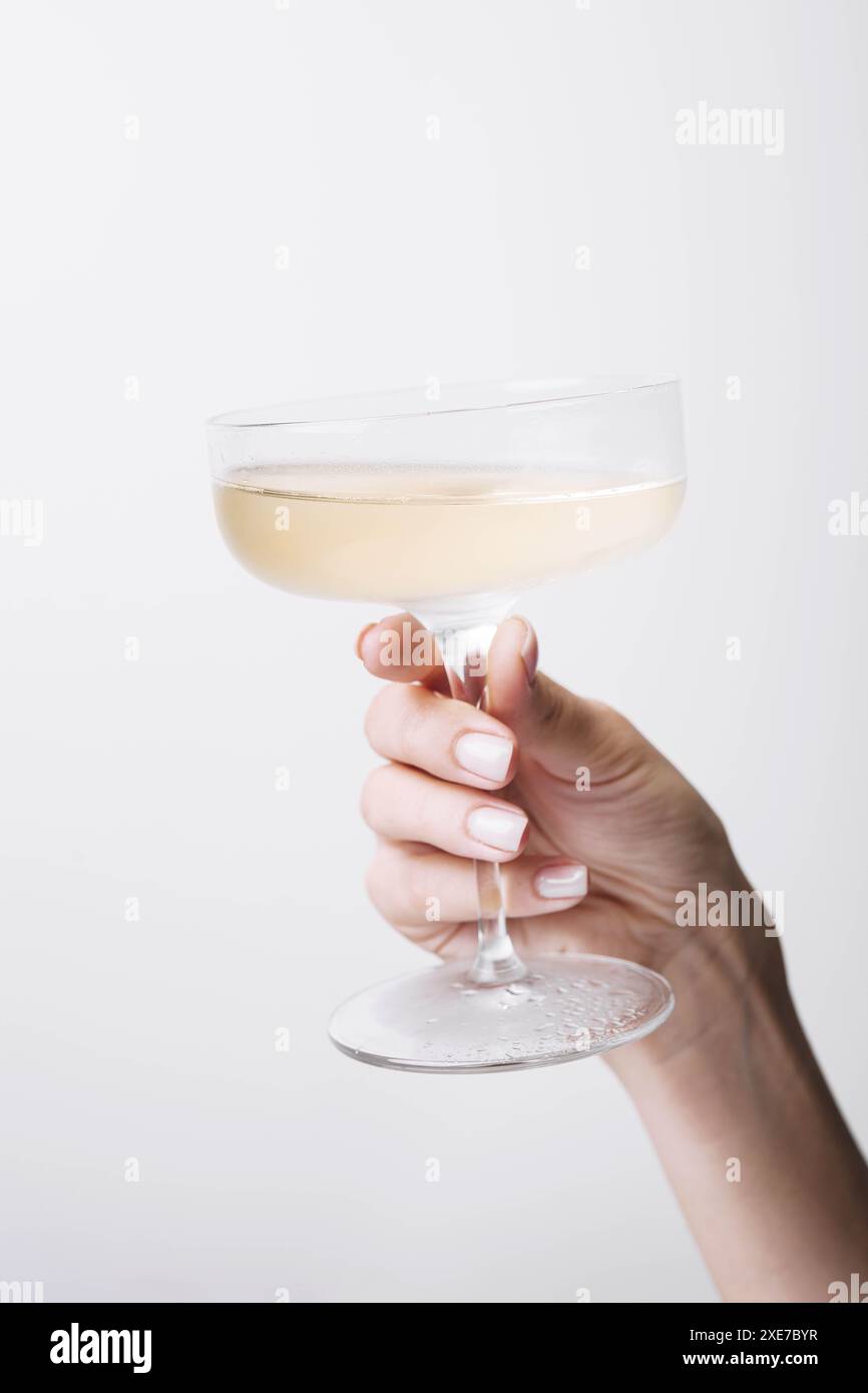 Hand holds glass hi-res stock photography and images - Alamy