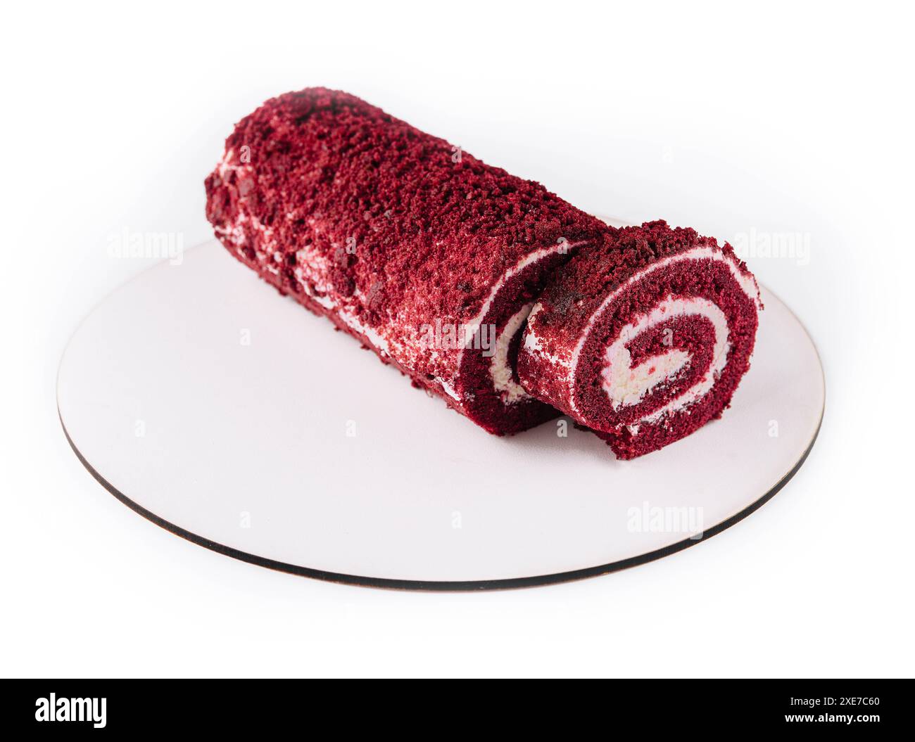 Sponge Swiss roll on white plate Stock Photo - Alamy