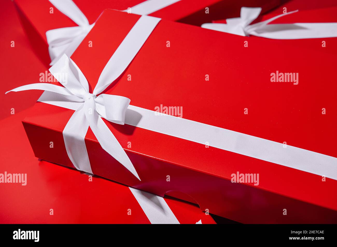 Christmas gifts red ribbon hi-res stock photography and images - Alamy