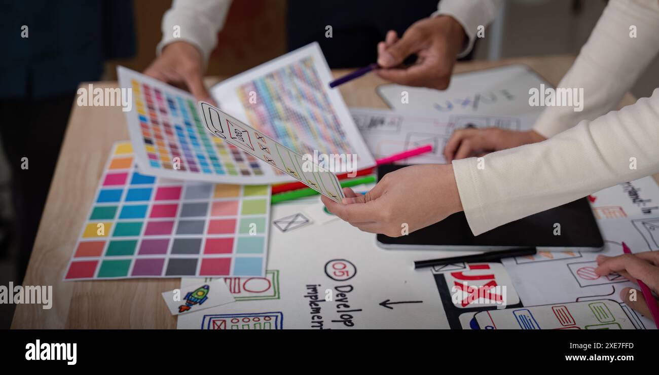 UX Developer and UI Designer Brainstorming Session with Color Palettes ...