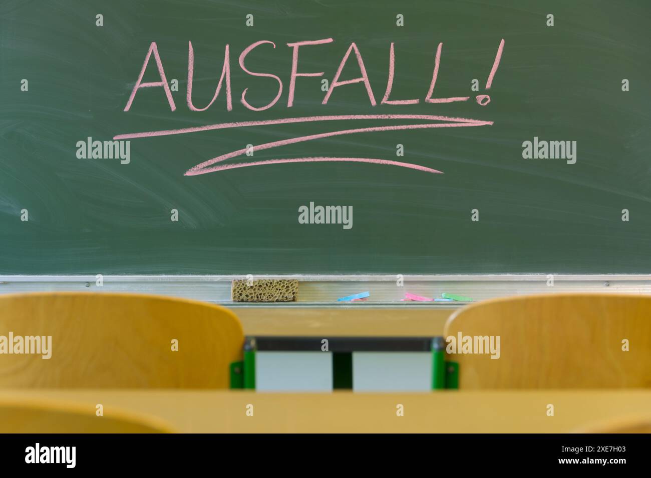 A school blackboard with the German word "AUSFALL" ("failure Stock ...