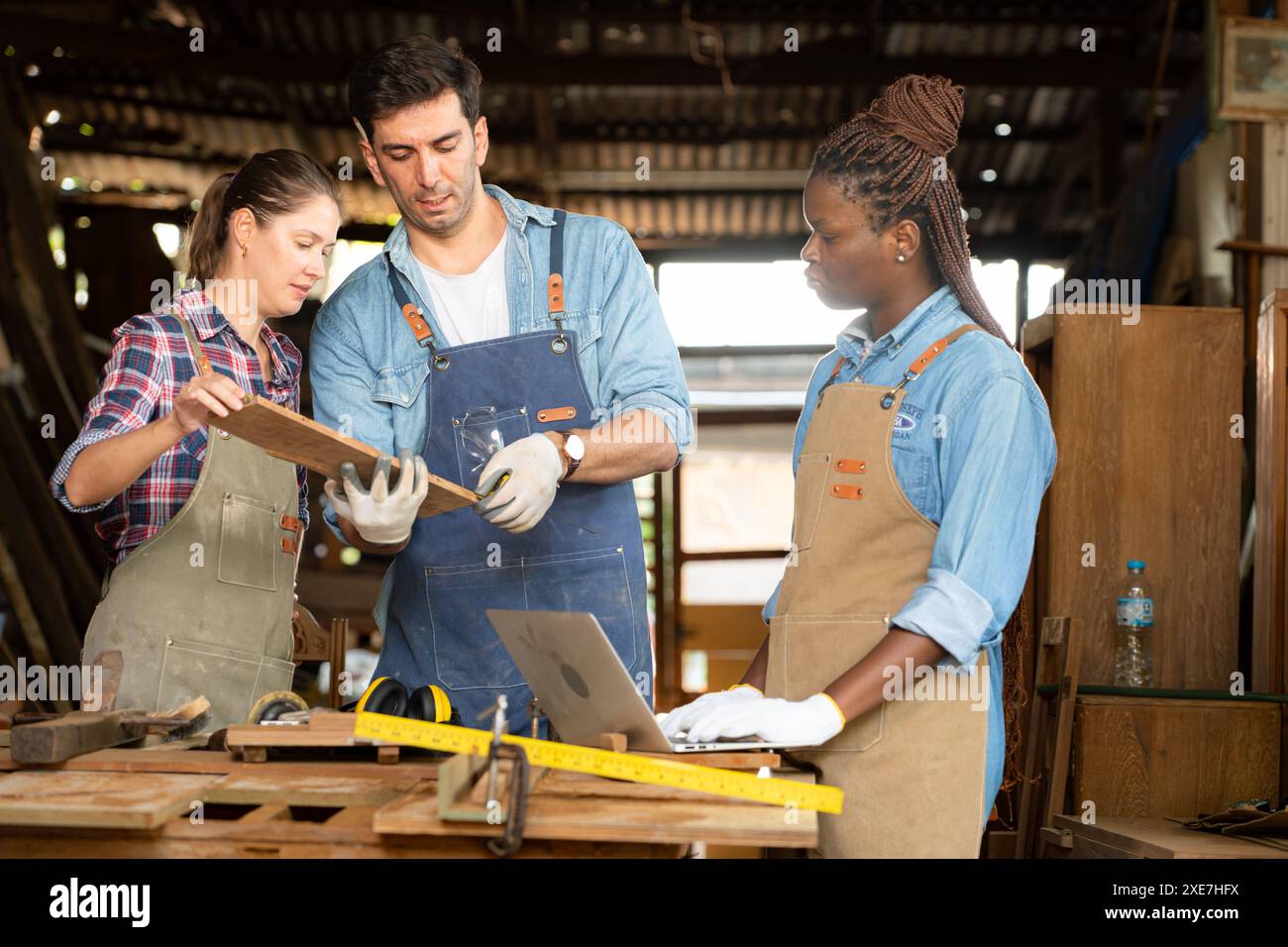 Young carpenter working in workshop hi-res stock photography and images ...