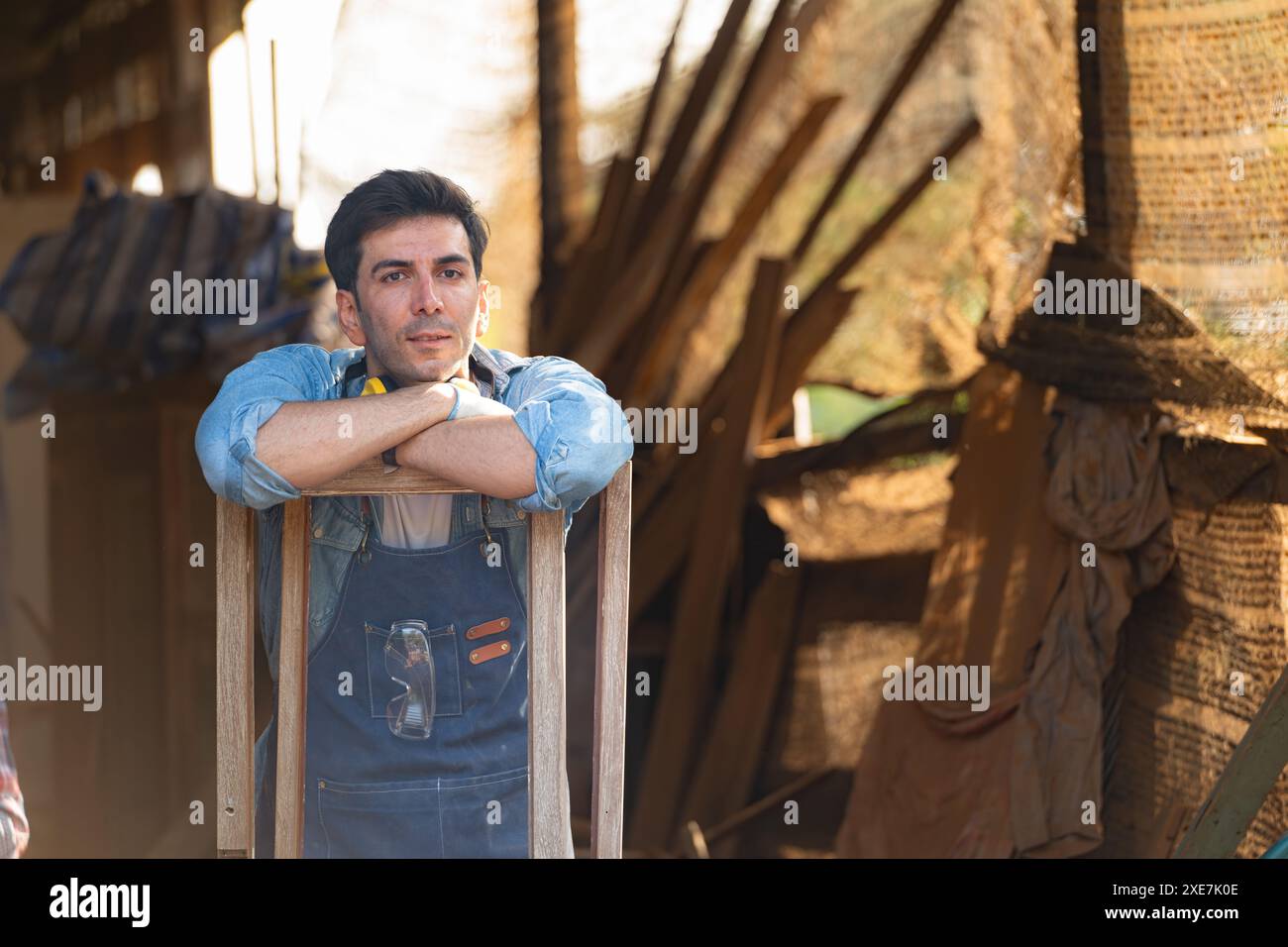Carpenter craftsman standing arms hi-res stock photography and images ...