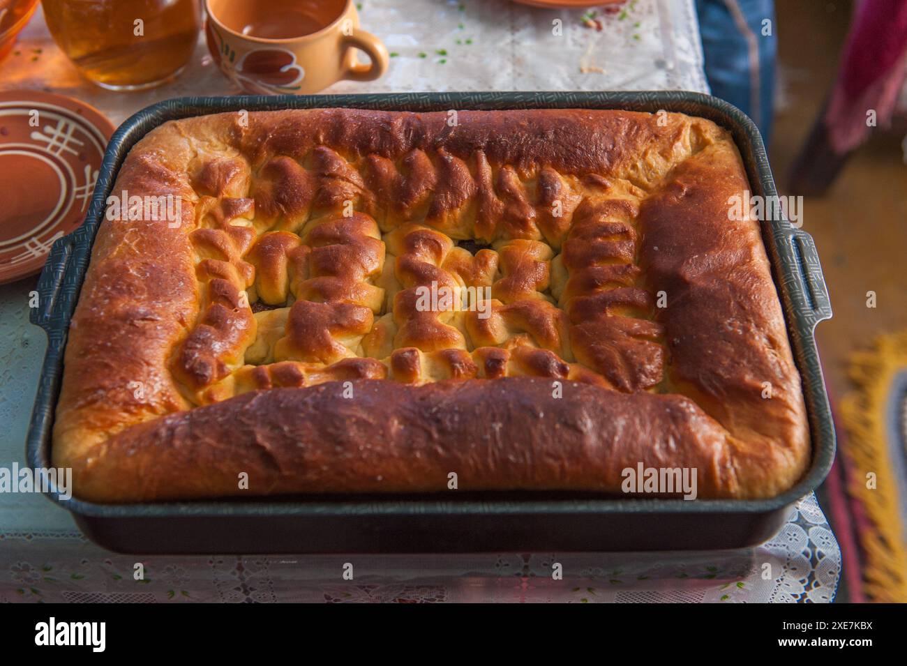 Closed pie with dough Stock Photo - Alamy