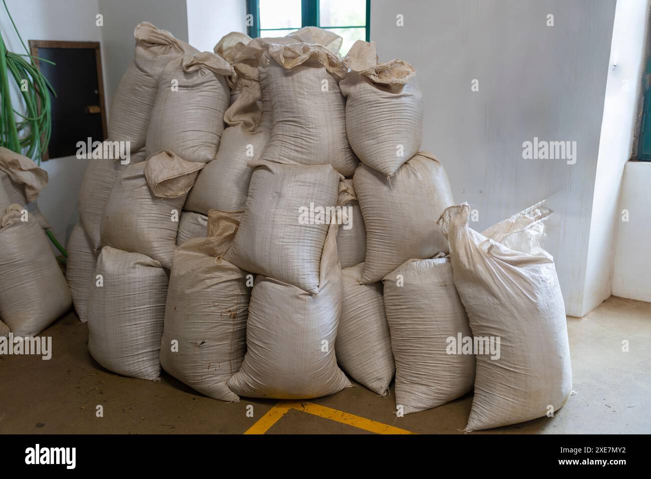 White sacks stacked hi-res stock photography and images - Alamy
