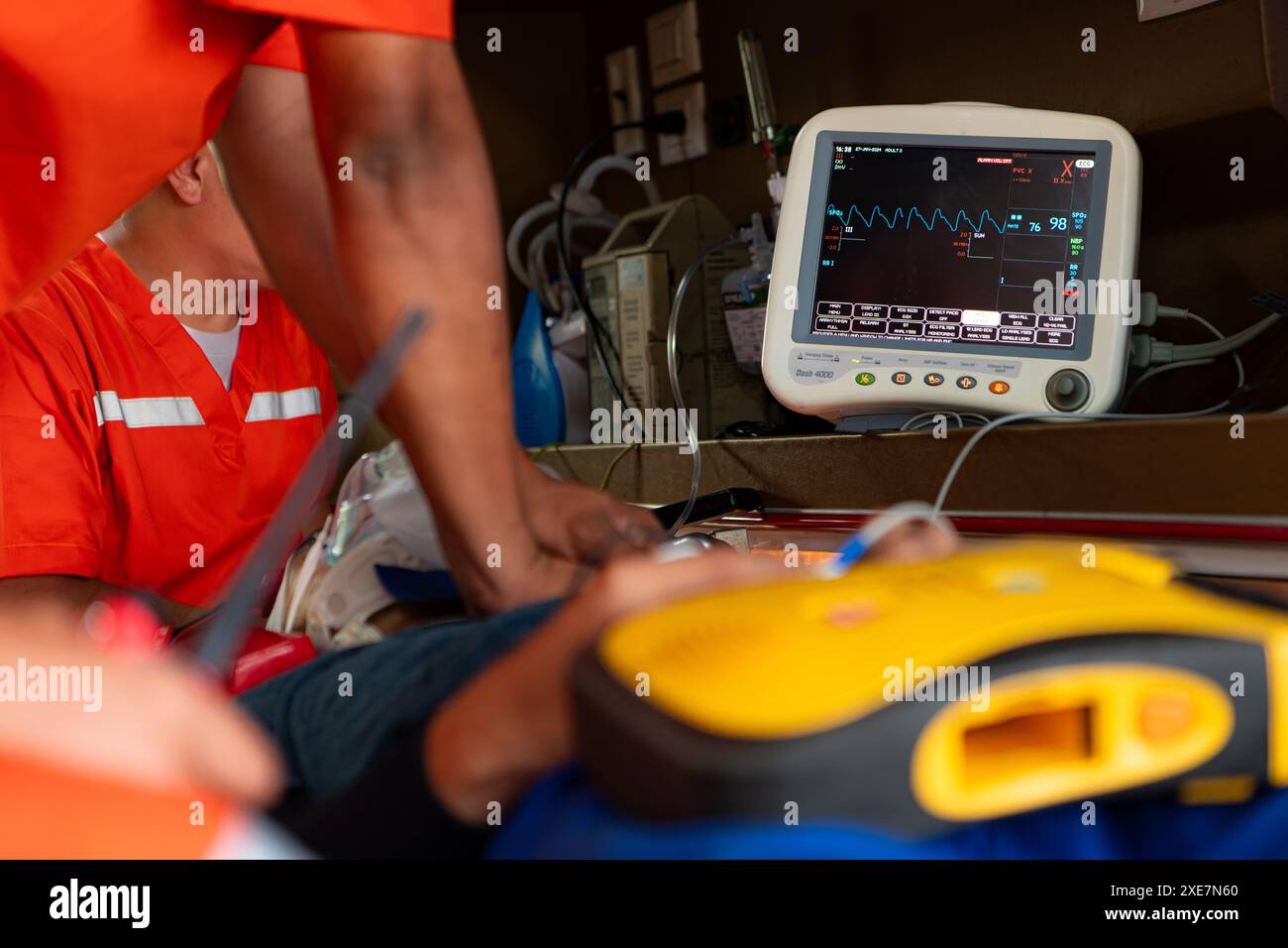 The rescue team is administering CPR to a patient who was involved in ...