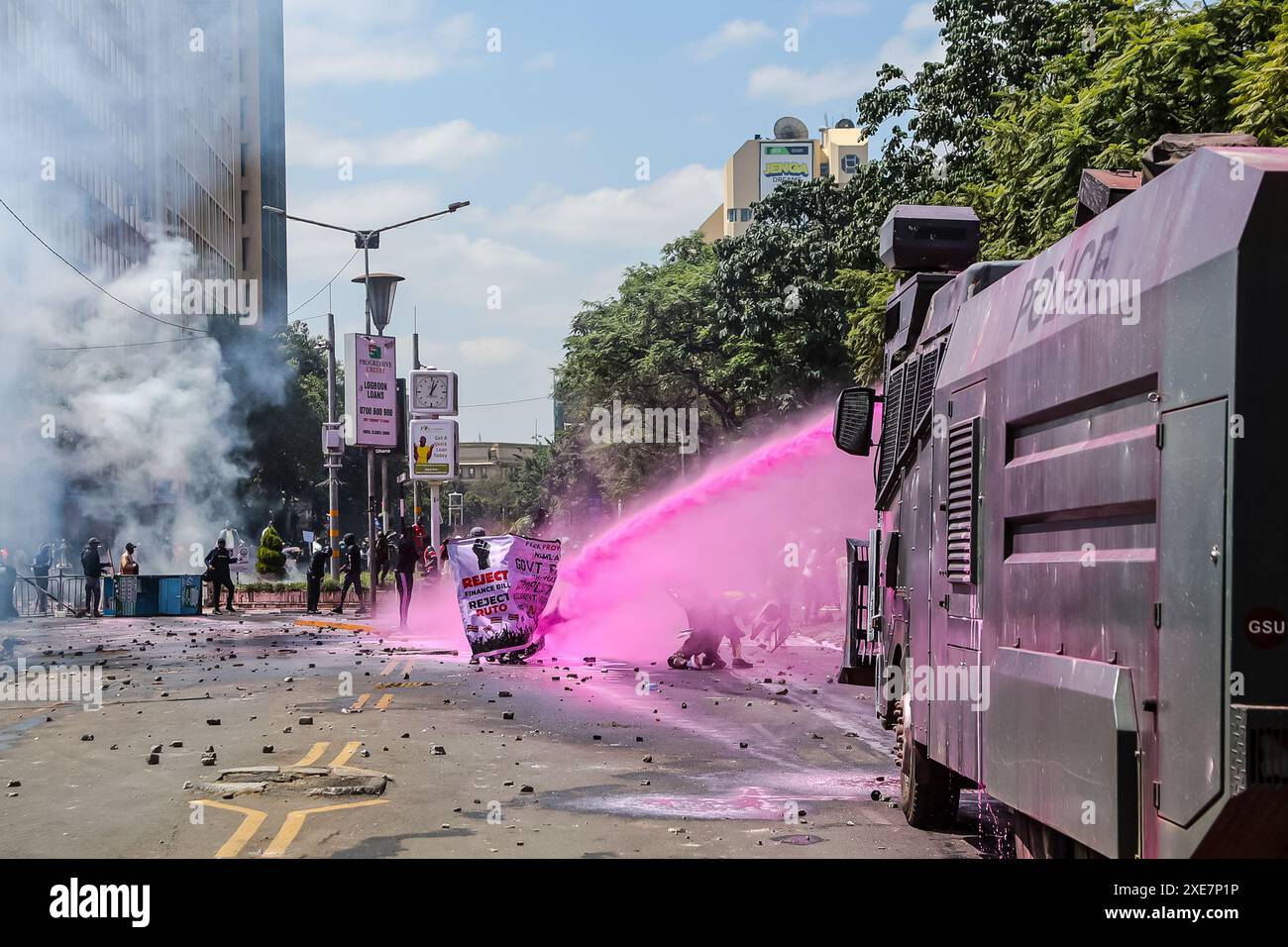 Anti-riot Police use teargas and water cannons to disperse protesters ...