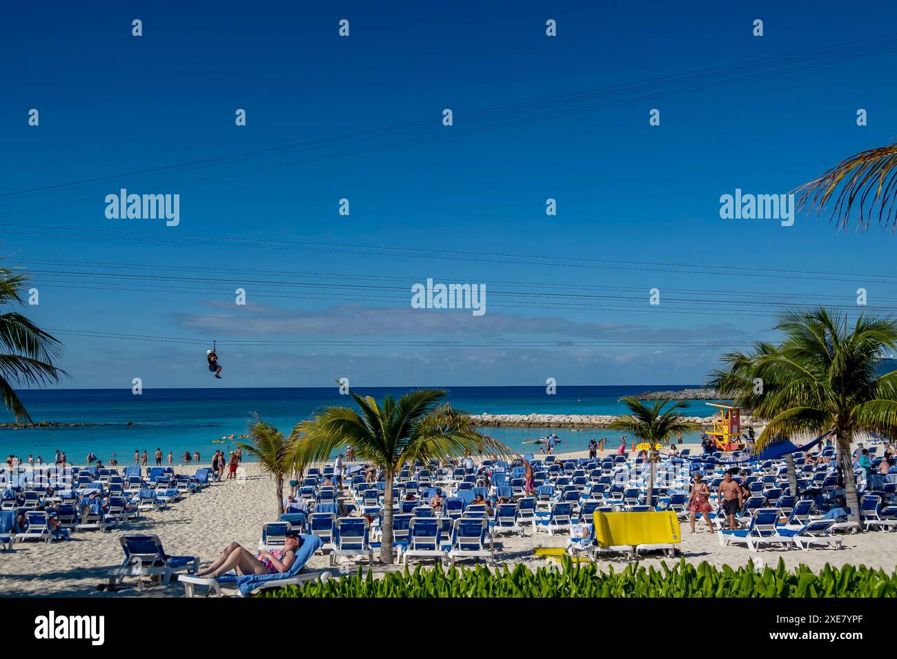 Caribbean Sun Retreat: Vacationers Revel in Serenity, Sunbathing Bliss on Great Stirrup Cay's ...