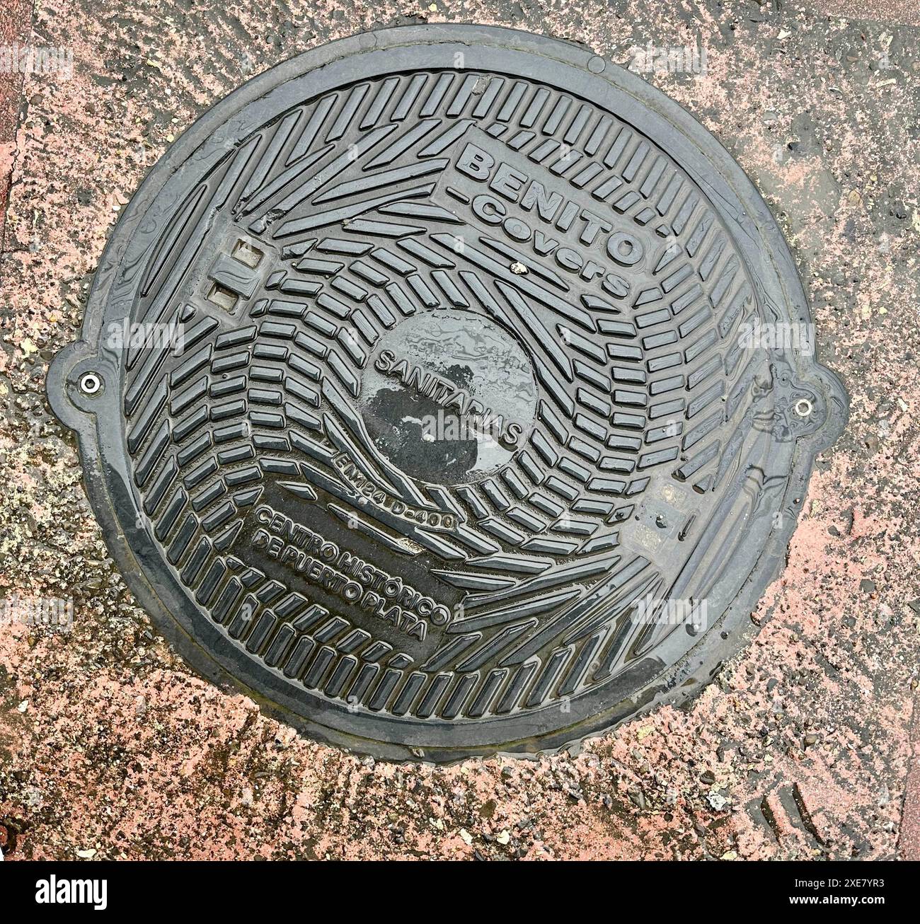 Puerto Plata's manhole cover: Weathered, adorned with local patterns ...