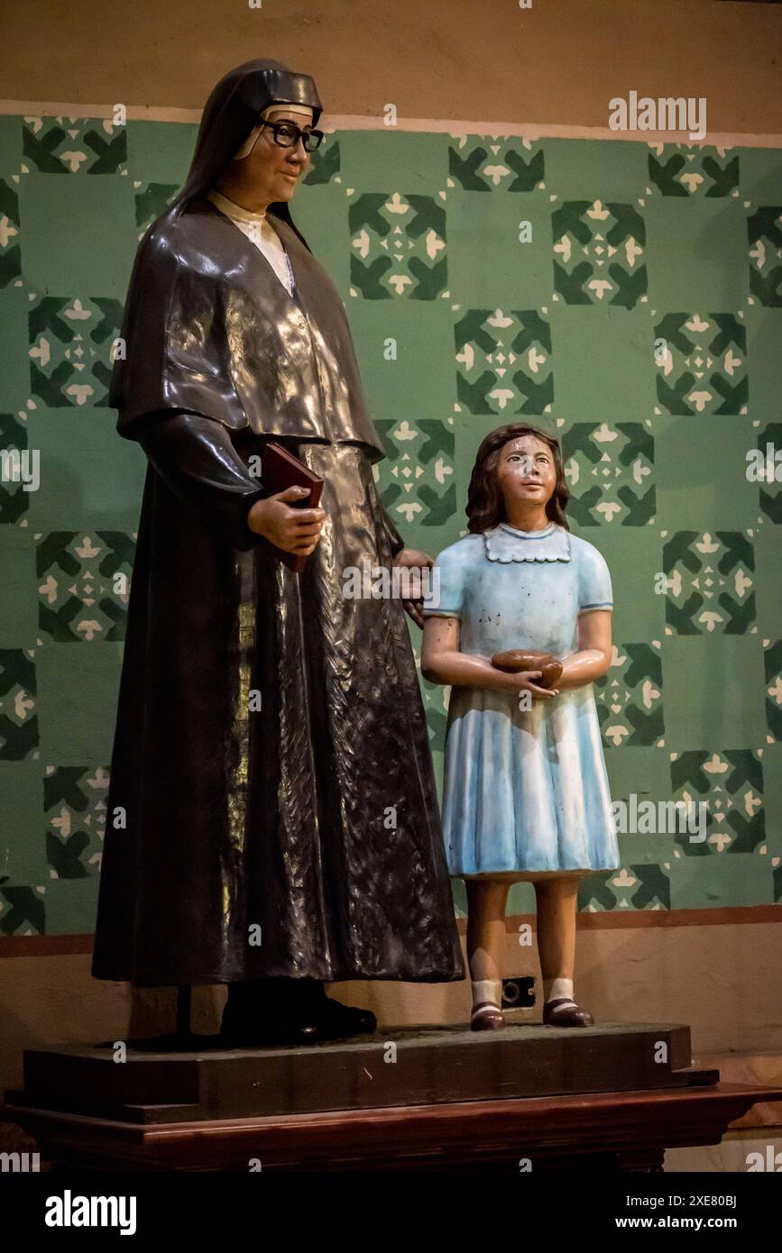 Statue of nun and child, Church of Our Lady of Mercy or Nuestra Señora ...