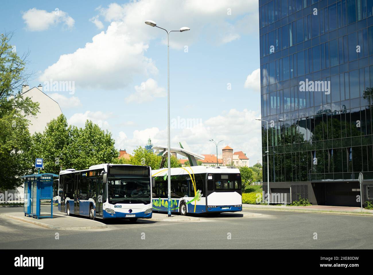 Electric and Hybrid Buses at Urban Charging Station Stock Photo - Alamy