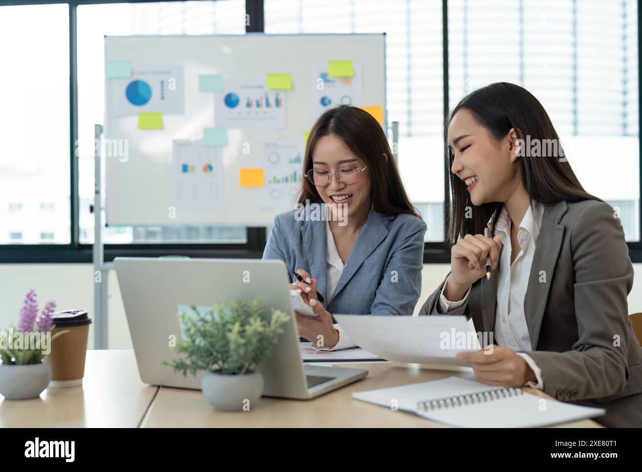Colleagues collaborating plants hi-res stock photography and images - Alamy