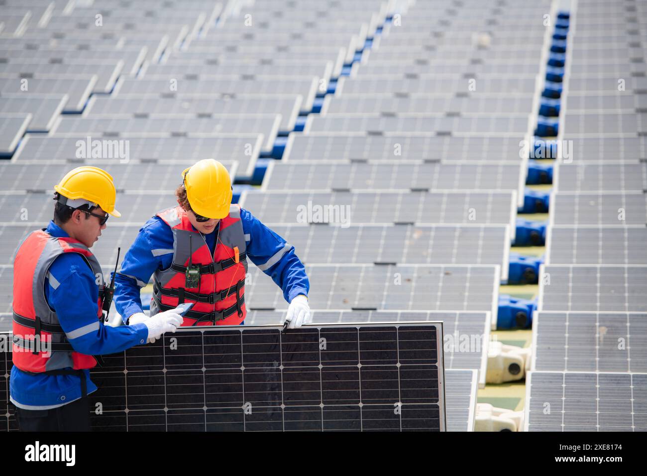 Photovoltaic engineers work on floating photovoltaics. Inspect and ...