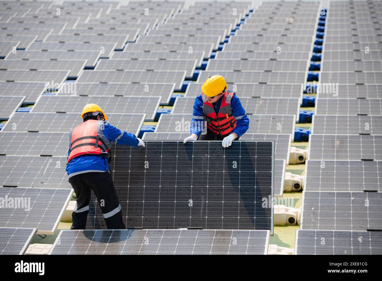 Photovoltaic engineers work on floating photovoltaics. Inspect and ...