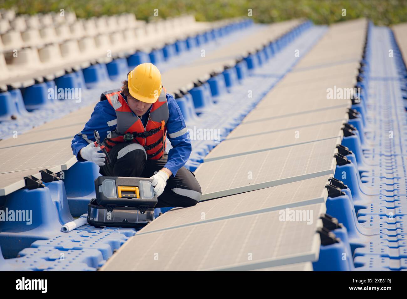 Photovoltaic engineers work on floating photovoltaics. Inspect and ...