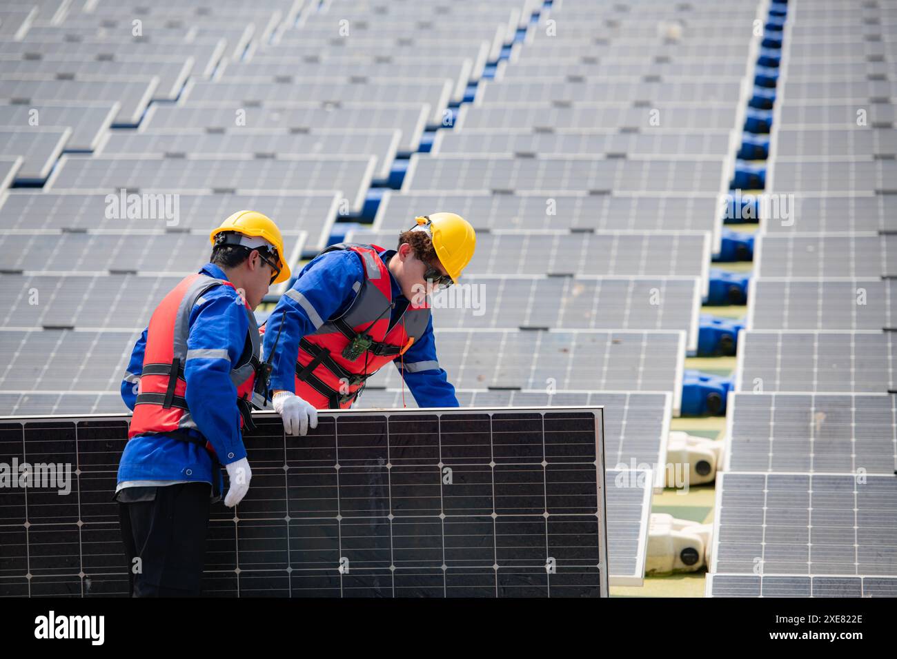 Photovoltaic engineers work on floating photovoltaics. Inspect and ...