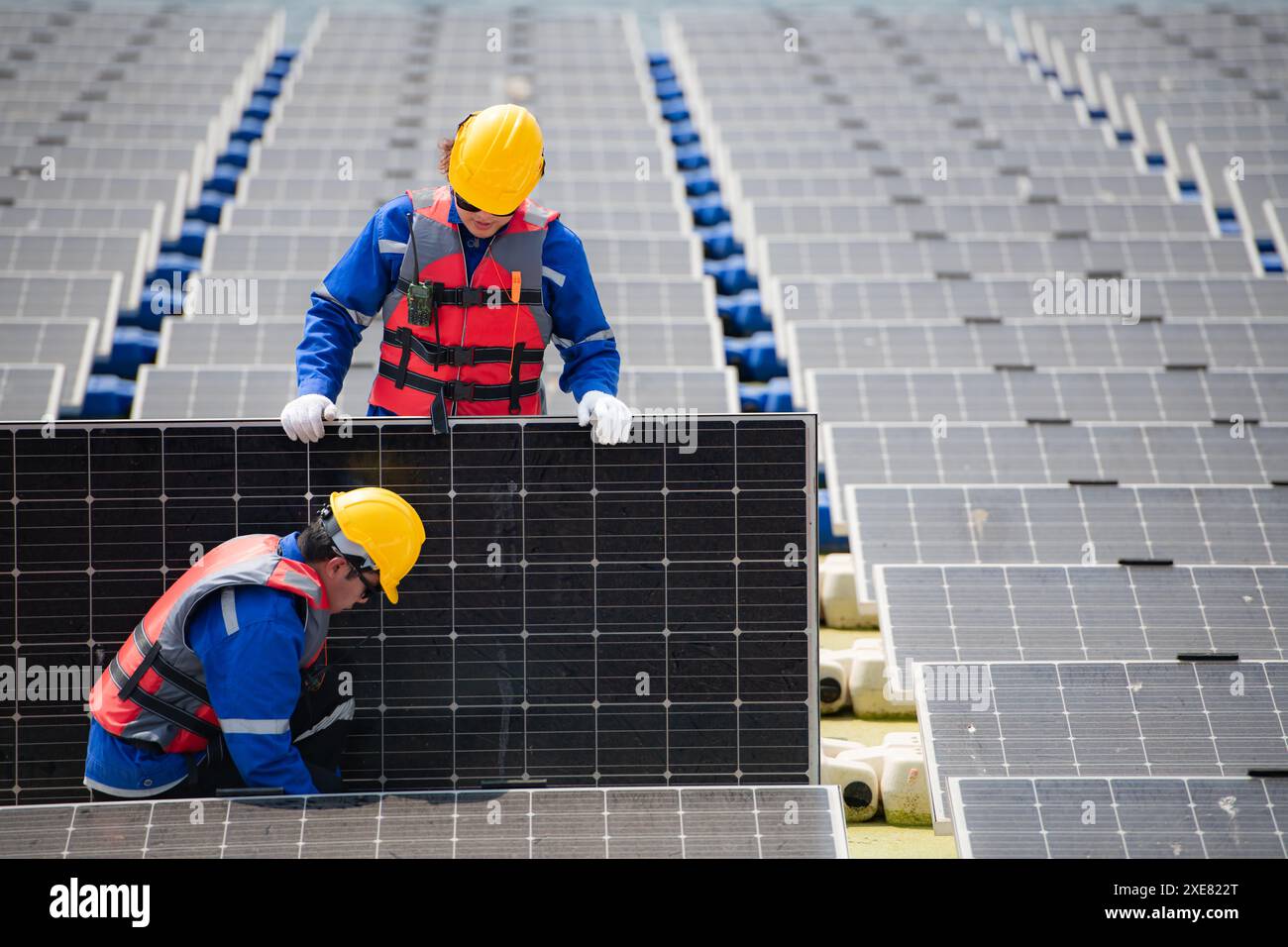 Photovoltaic engineers work on floating photovoltaics. Inspect and ...