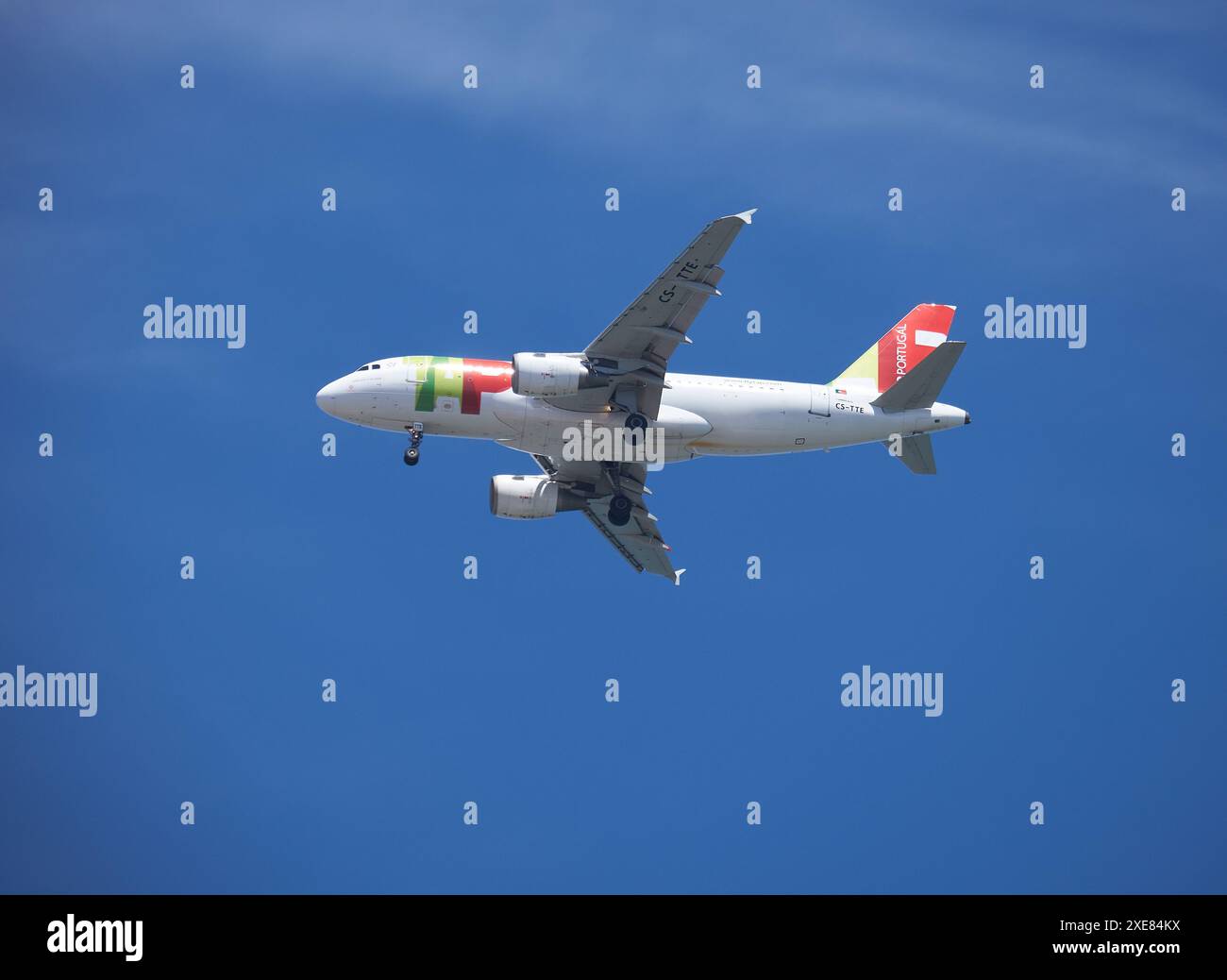 Plane of TAP Pogtugal flying in the sky Stock Photo - Alamy