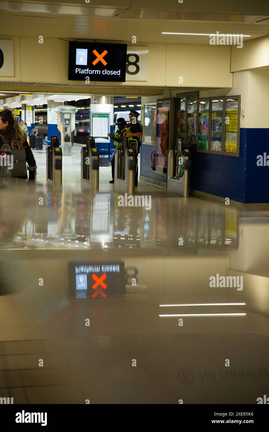 Electric boards informing about platform closure are seen at Euston ...