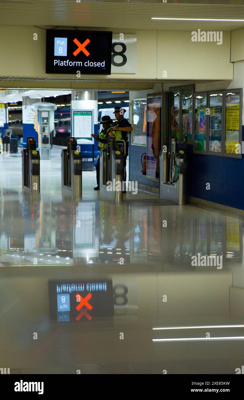 Electric boards informing about platform closure are seen at Euston ...
