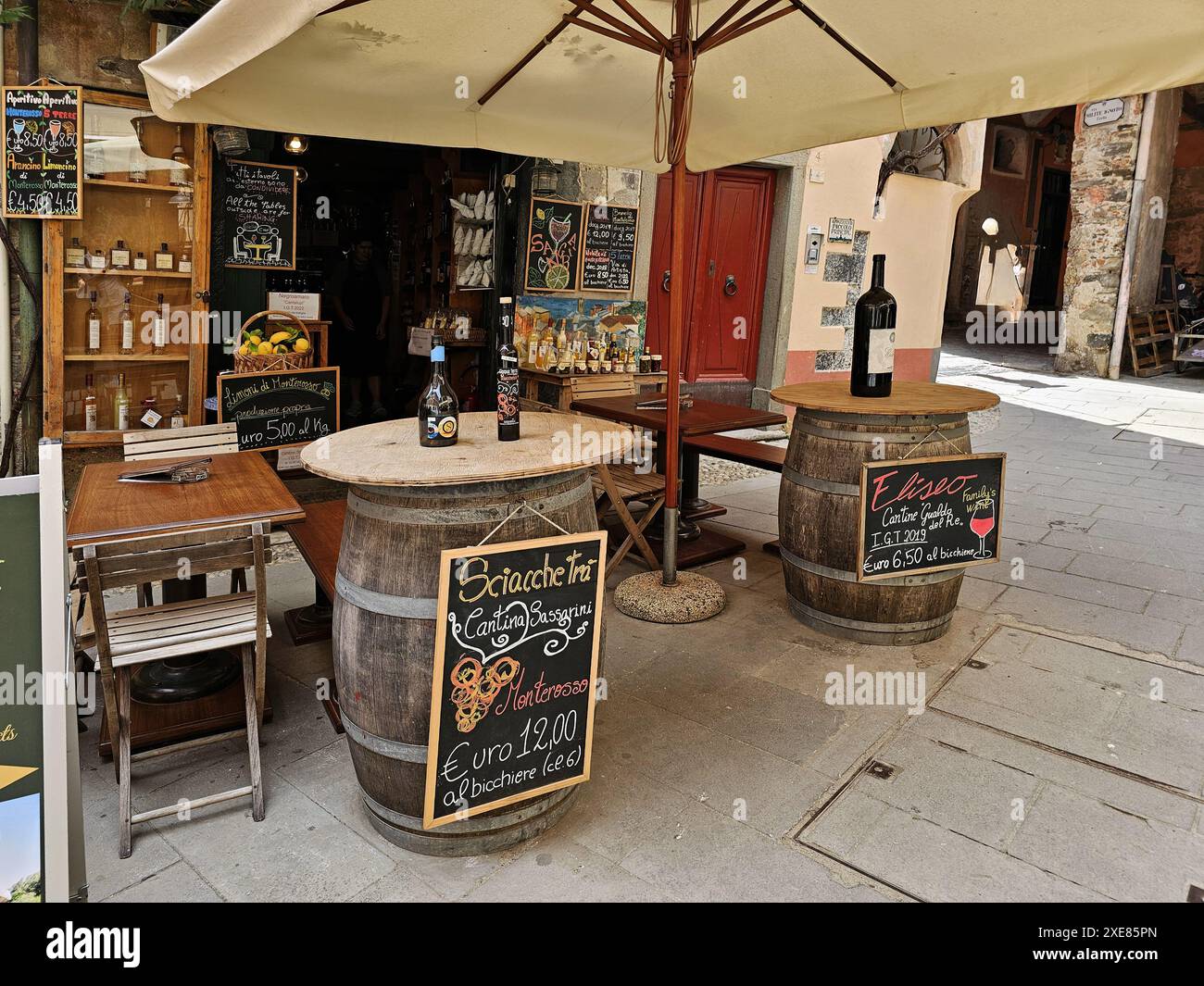 Open bar in old town Monterosso, Cinque Terre, Italy. Wine barrel ...
