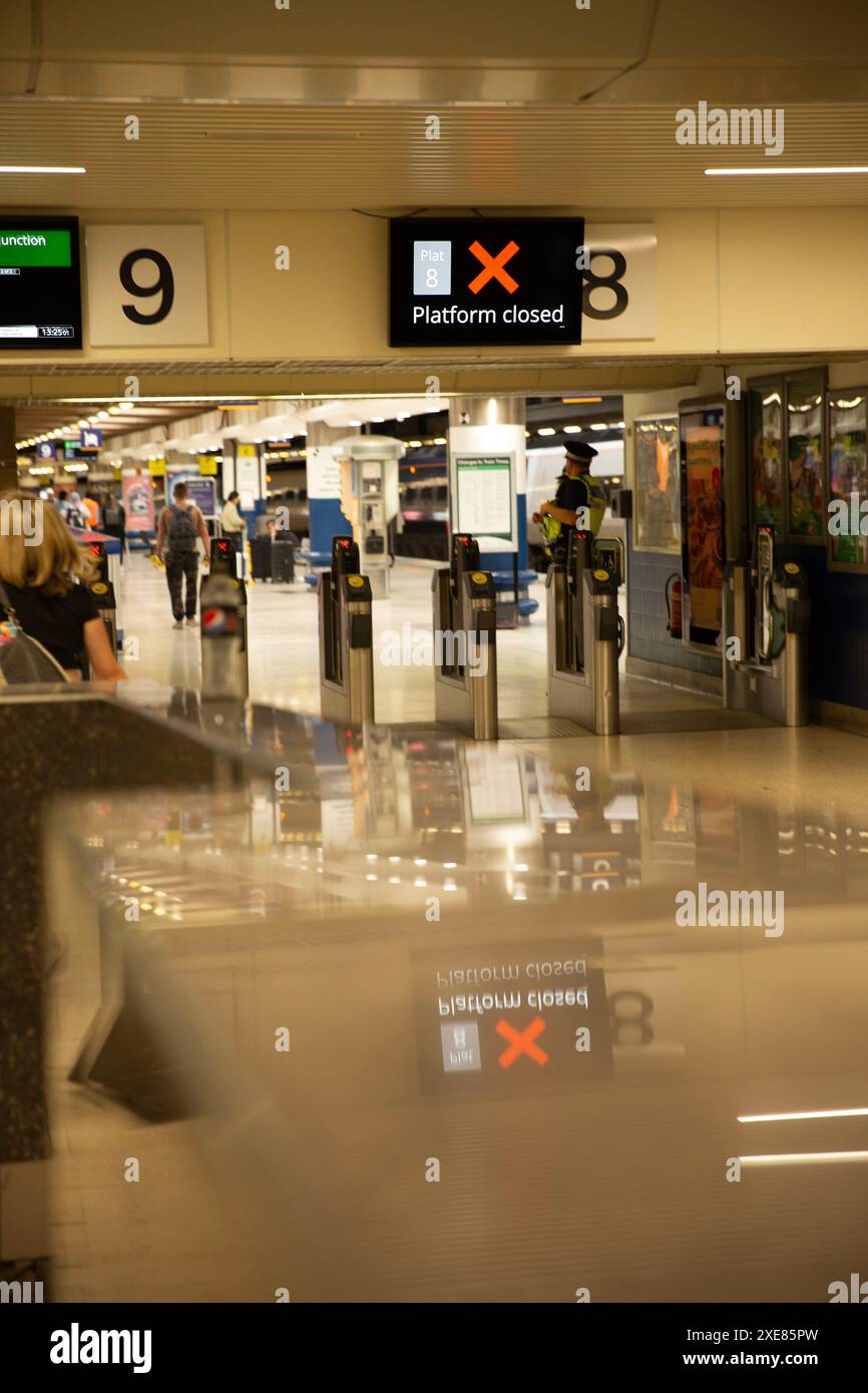 Electric boards informing about platform closure are seen at Euston ...
