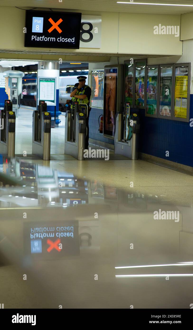 Electric boards informing about platform closure are seen at Euston ...