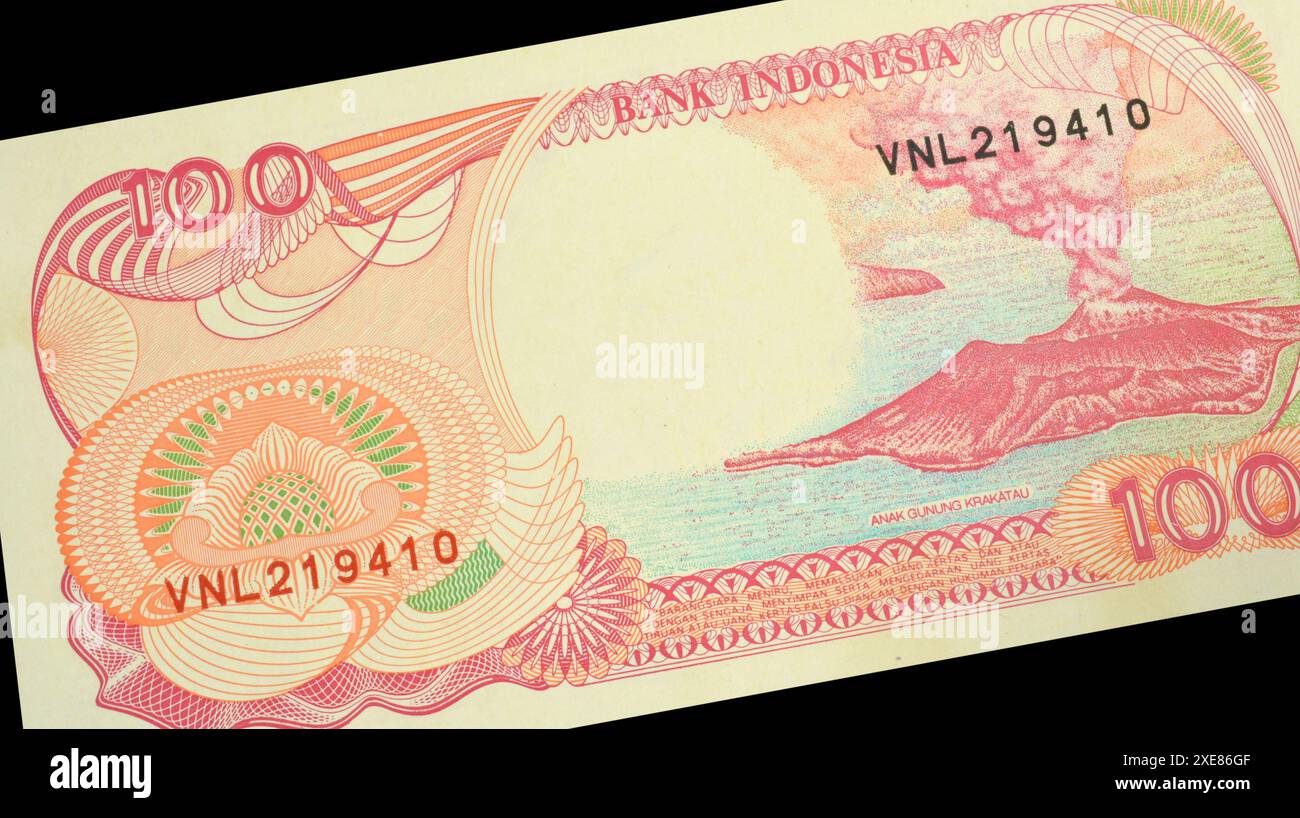 100 Rupiah banknote printed by Indonesia, that shows Eruption from ...