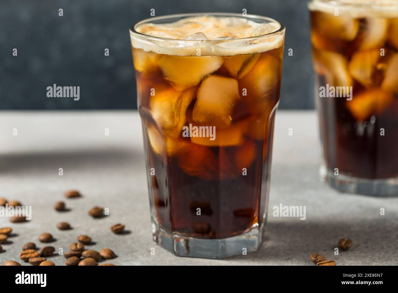 Cold Iced Americano Coffee in a Glass with Ice Stock Photo - Alamy