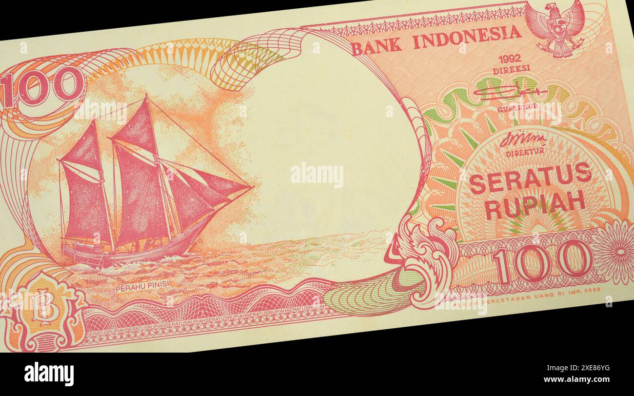 100 Rupiah banknote printed by Indonesia, that shows Sailboat (Pinisi ...
