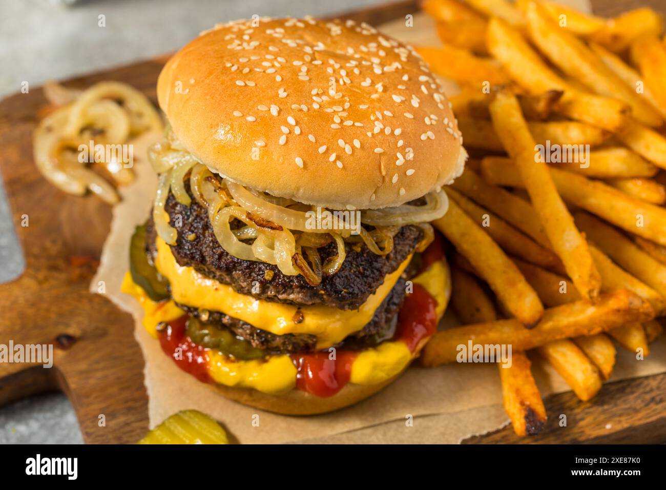Homemade Chicago Big Baby Cheeseburger with Pickles and Onions Stock ...