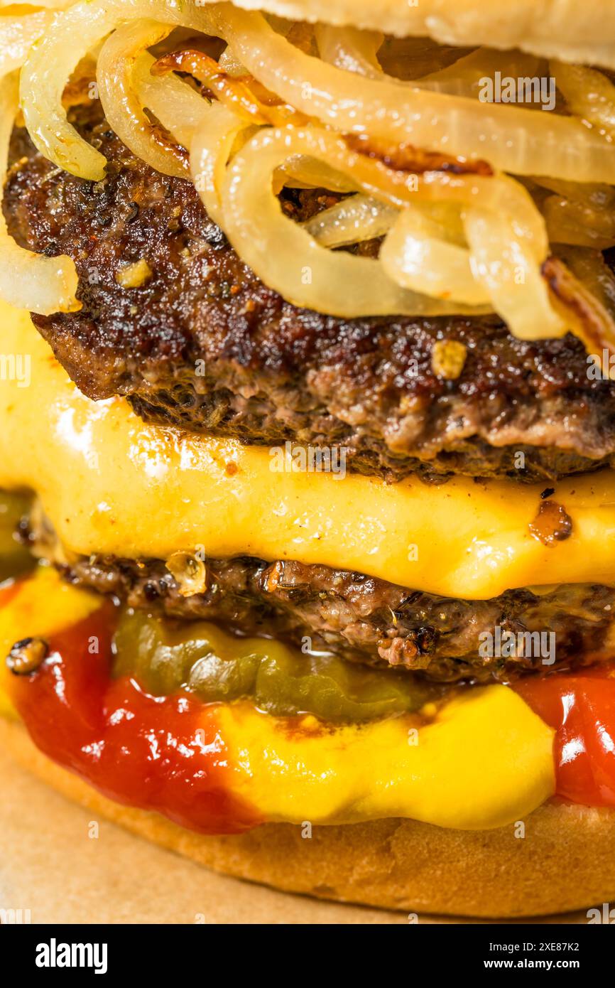 Homemade Chicago Big Baby Cheeseburger with Pickles and Onions Stock ...