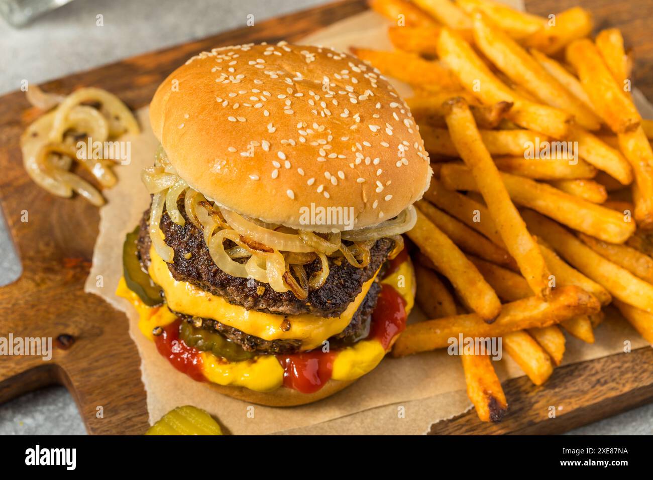 Homemade Chicago Big Baby Cheeseburger with Pickles and Onions Stock ...