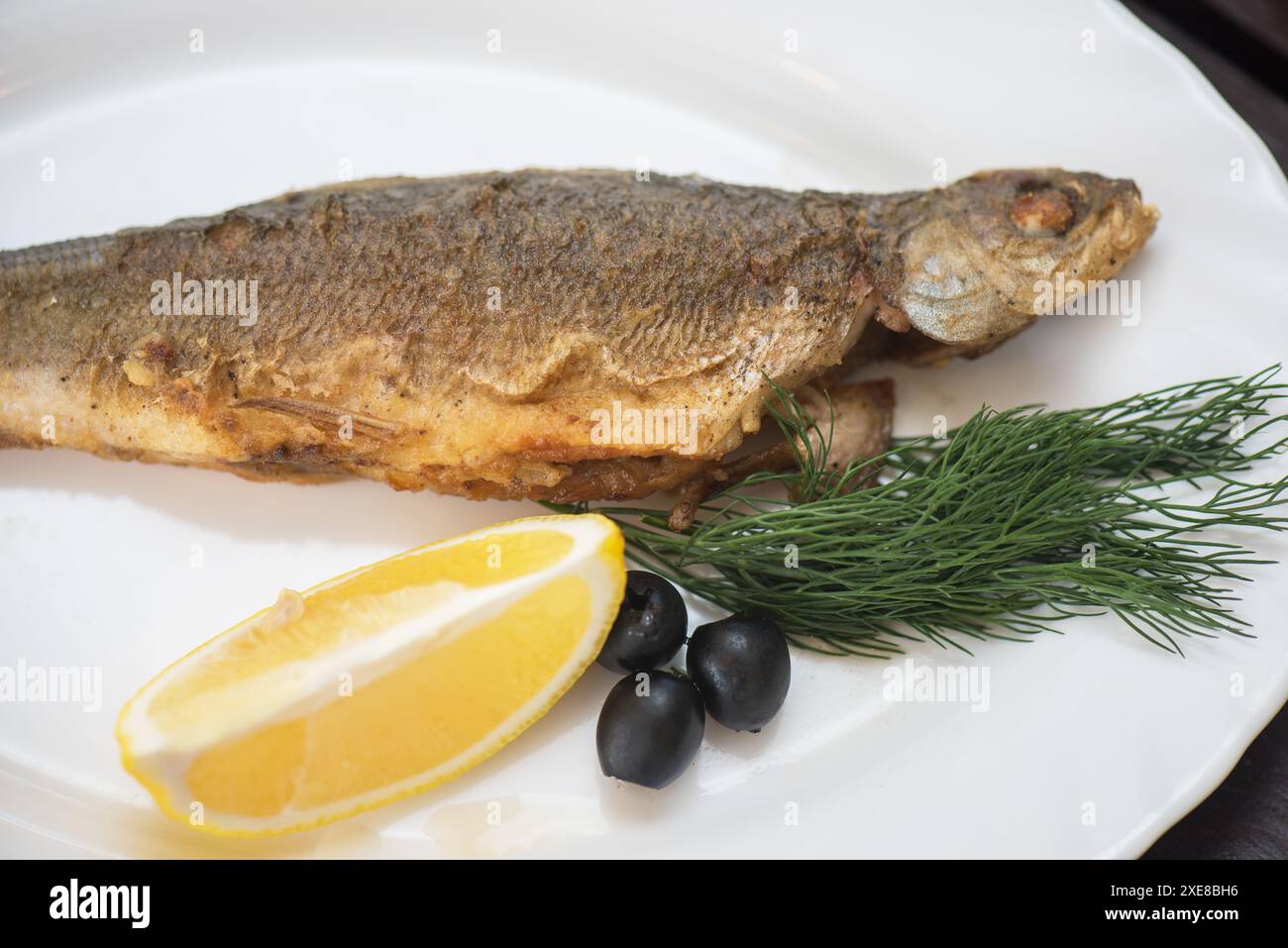 Fried grayling fish Stock Photo - Alamy